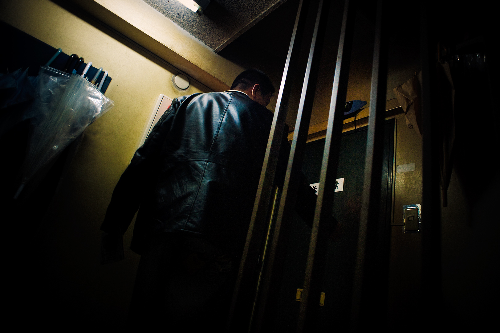 Bodyguard opens the door to SouichirouÕs office in Kabukicho, Tokyo ...